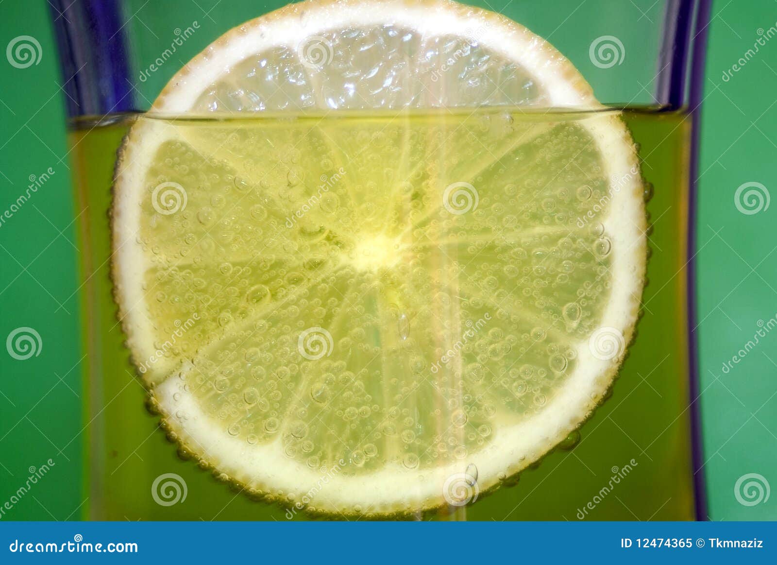 Cold drink with lemon stock image. Image of lighting - 12474365