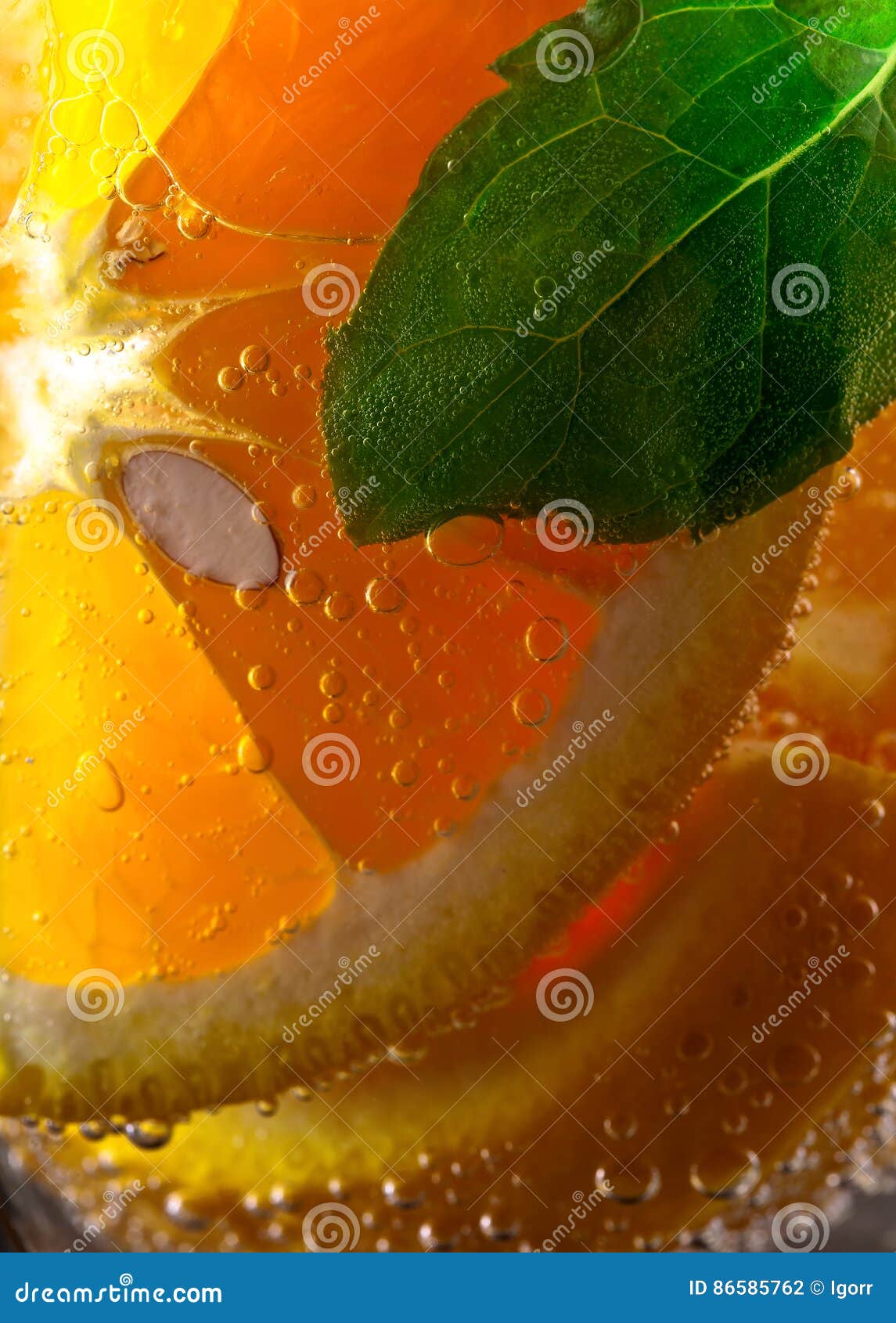 Cold Drink with Orange and Peppermint Stock Photo - Image of cocktail ...