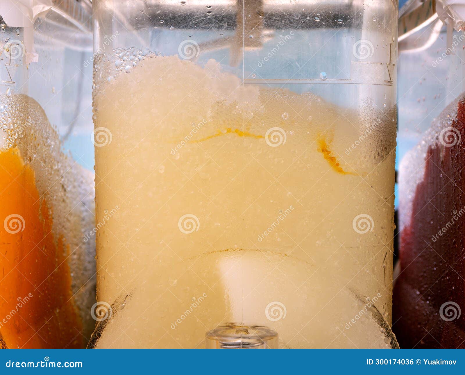Cold Fruit Smoothie with Small Bubbles in Blending Machine Front View ...
