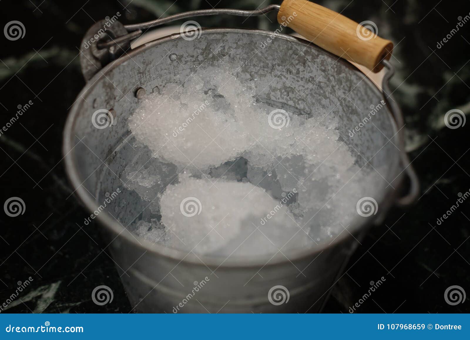 Cold ice in a bucket stock image. Image of table, equipment - 107968659