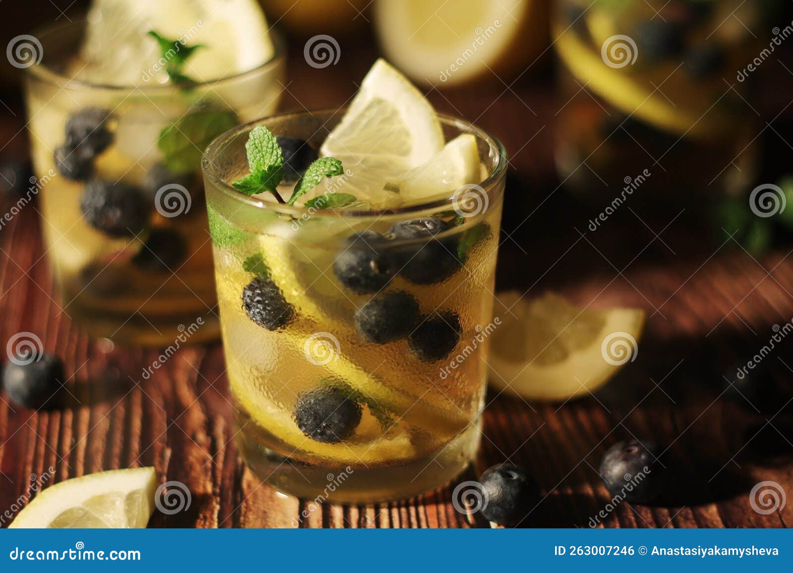 Cold Ice Tea with Lemon and Berries Stock Photo - Image of liquid ...