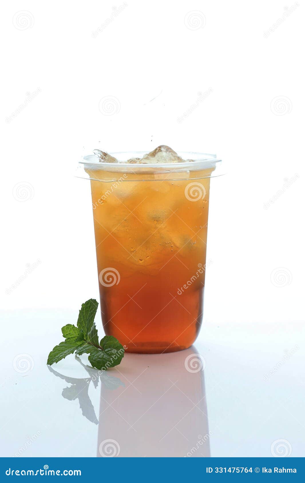 Cold Ice Tea with Mint Leaf on White Table Stock Photo - Image of ...