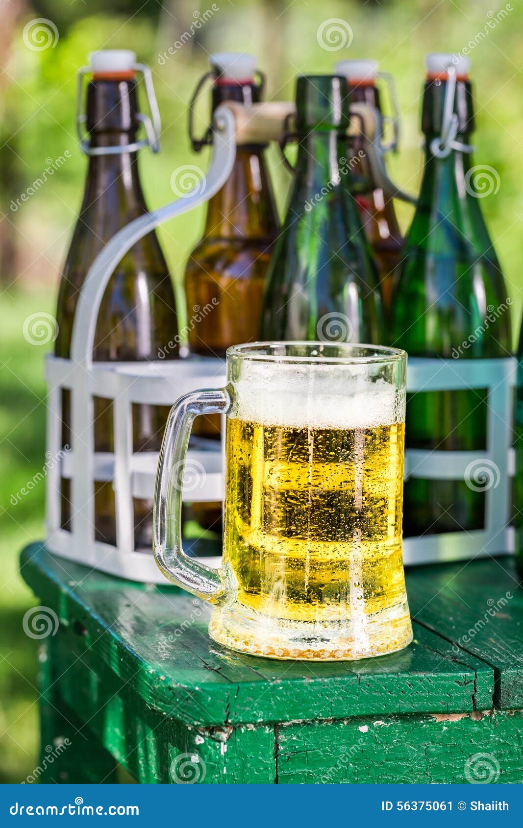 Cold lager beer in garden stock image. Image of table - 56375061
