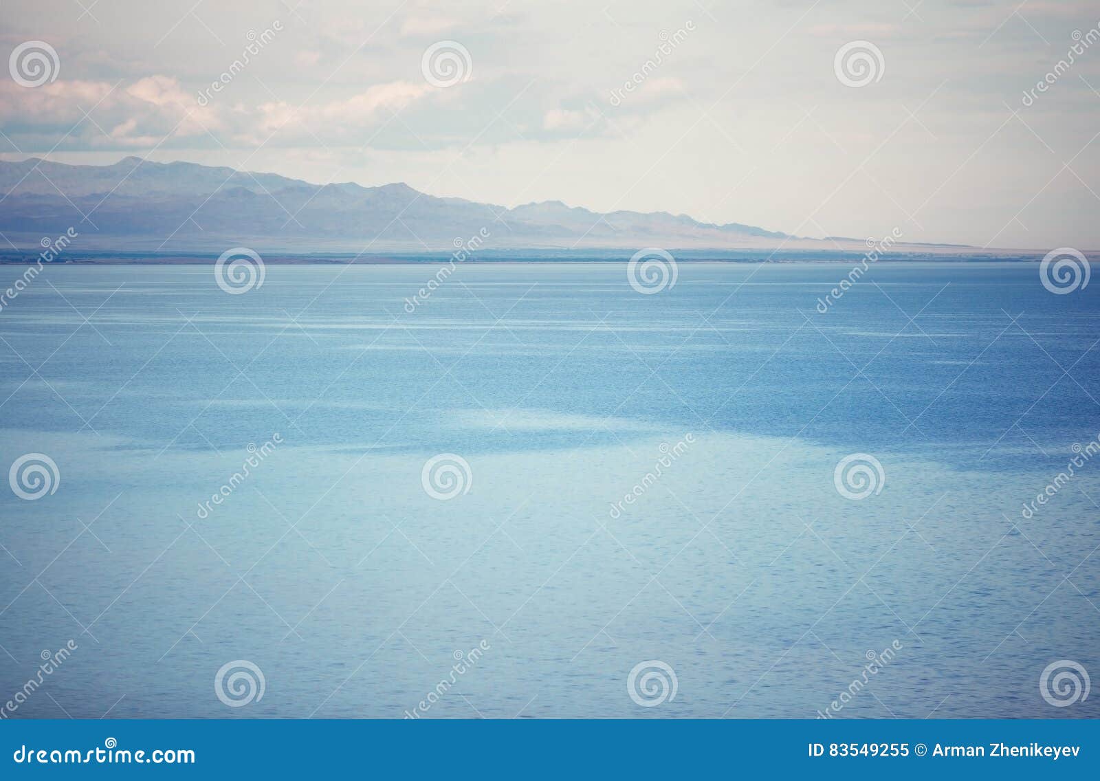 Cold lake with mountains stock image. Image of color - 83549255