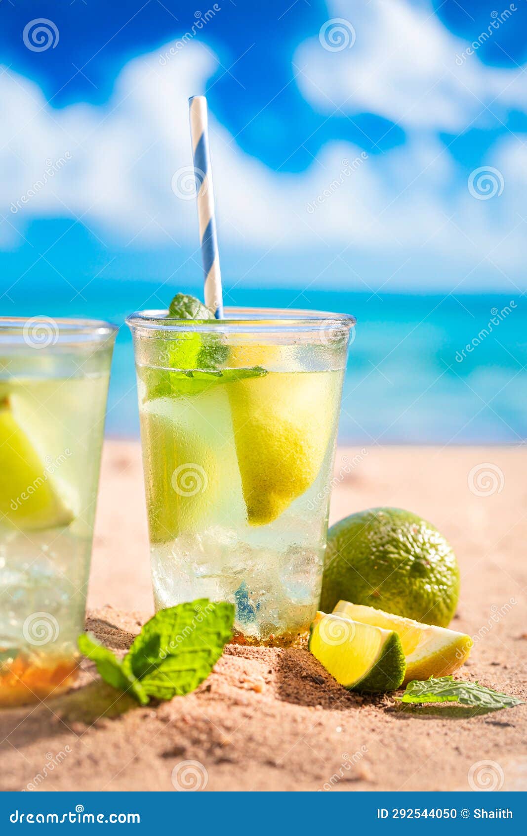 Cold Lemonade with Ice on Sandy Beach Stock Photo - Image of ocean ...