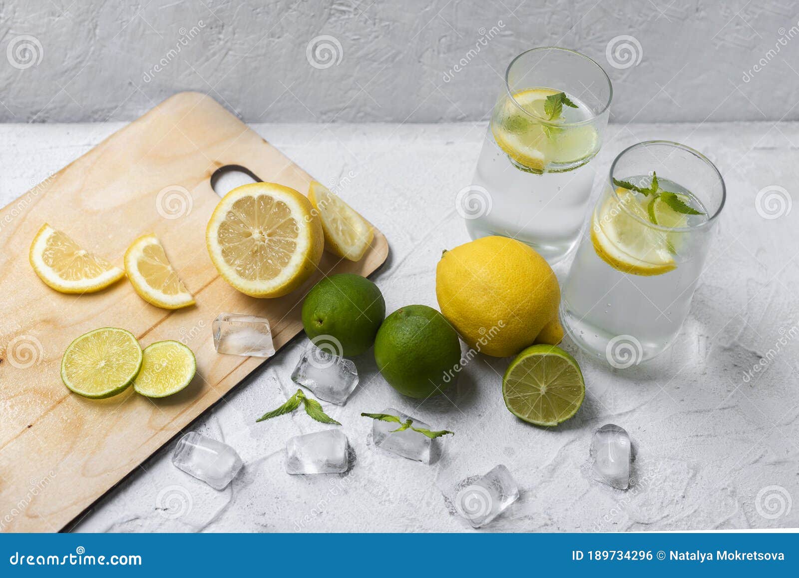 Cold Lemonade with Ice. Tasty Lemonade with Lemon, Lime and Mint.Cold ...