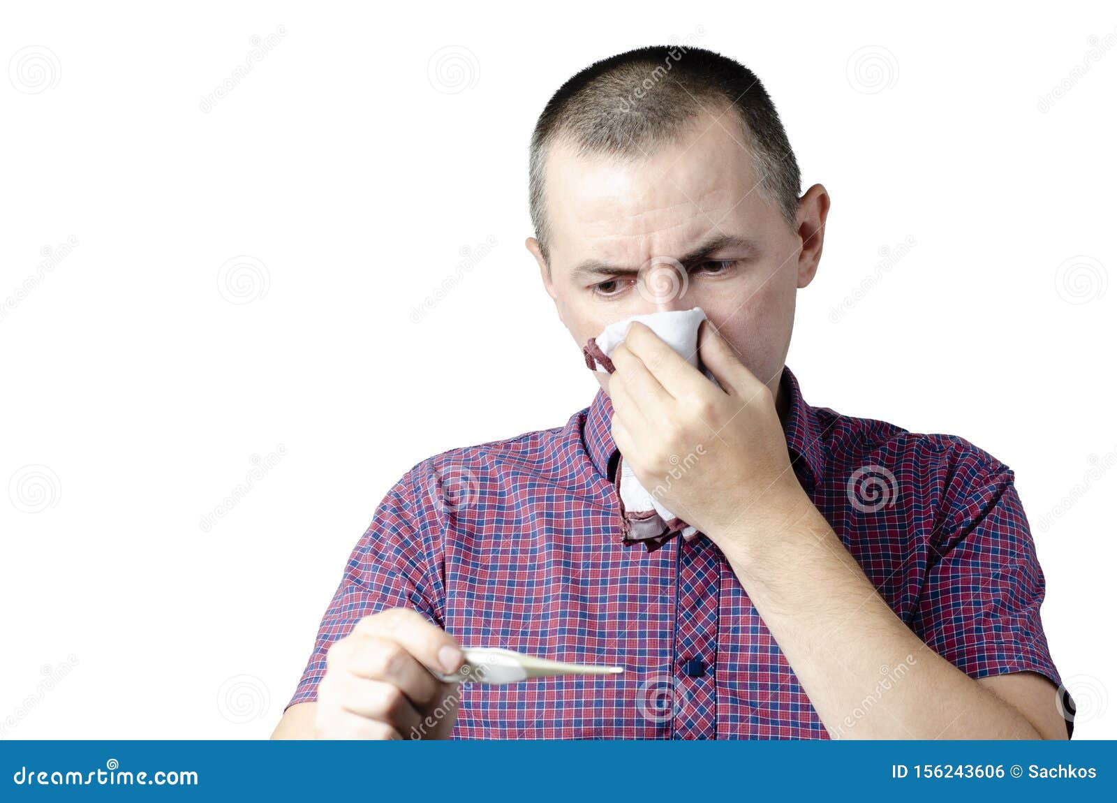 A Cold Man Measures His Temperature with a Thermometer and Coughs into ...