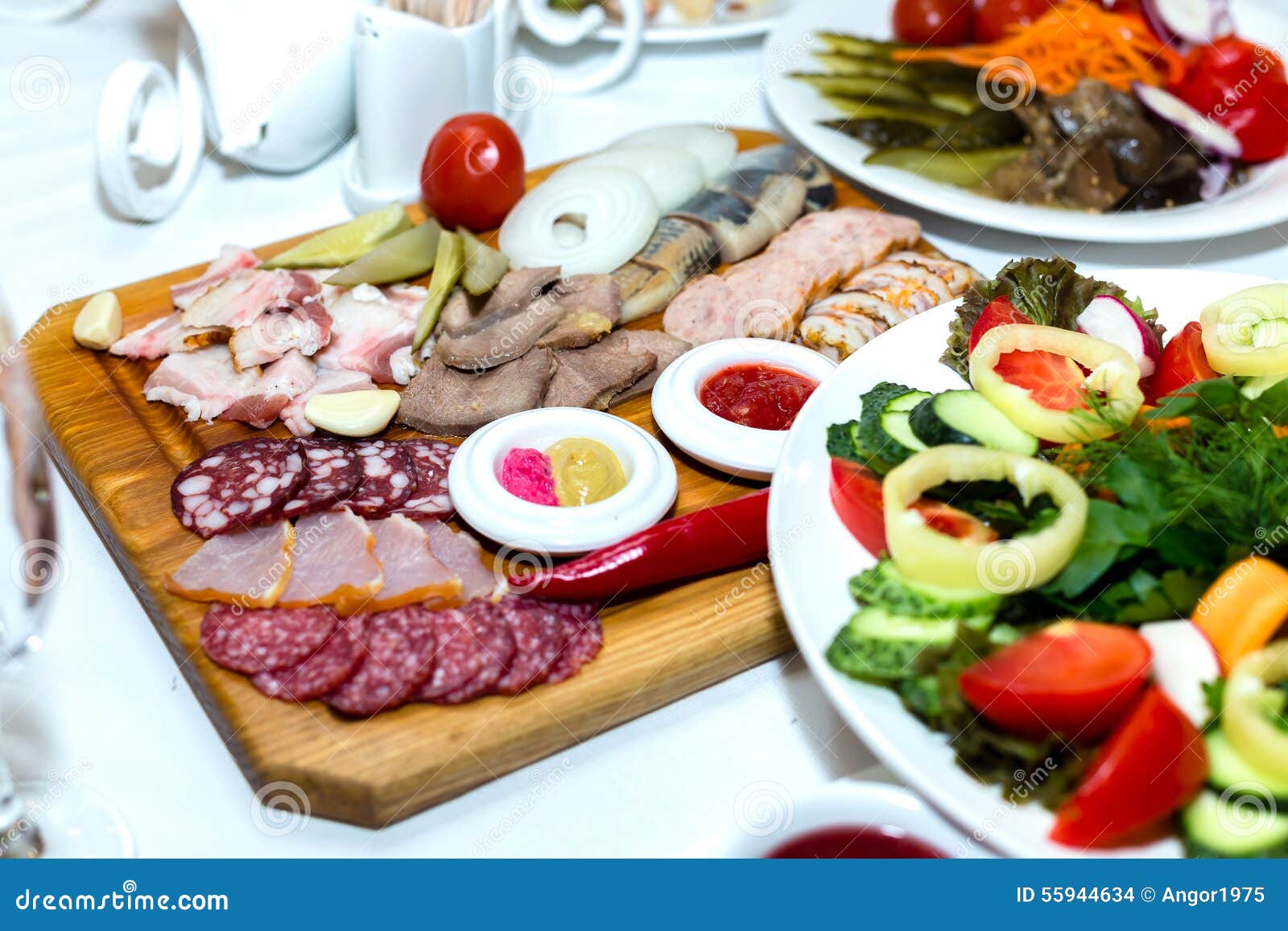 Cold Meats on Wooden Plate on Banquet Table Stock Photo - Image of ...