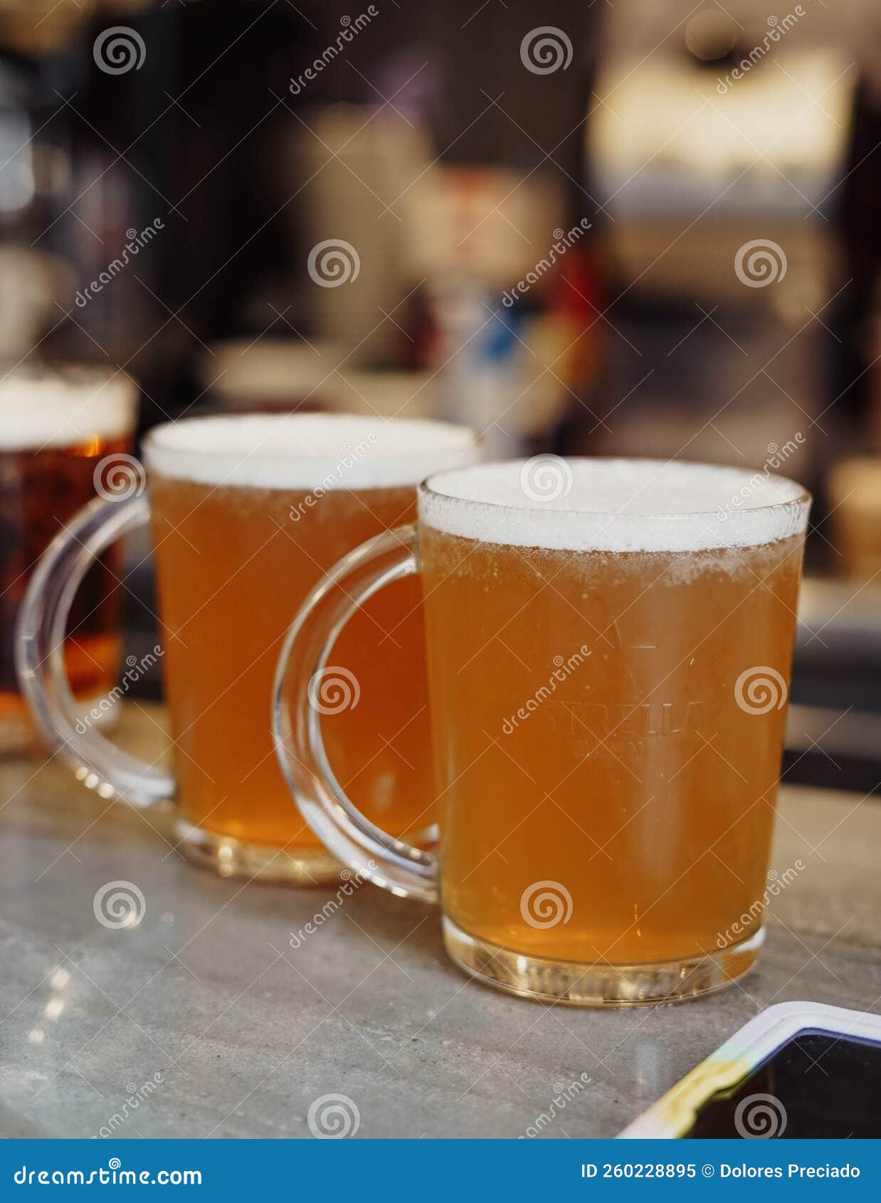 Cold Mugs of Beer on a Terrace Table Stock Image - Image of counter ...