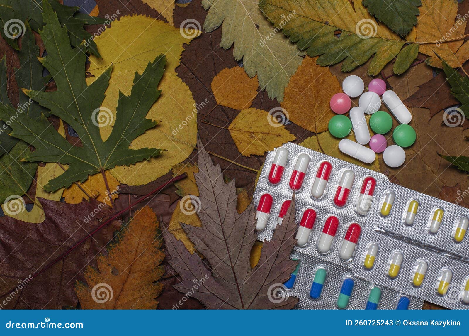 Cold Pills on the Background of Autumn Leaves Stock Image - Image of ...