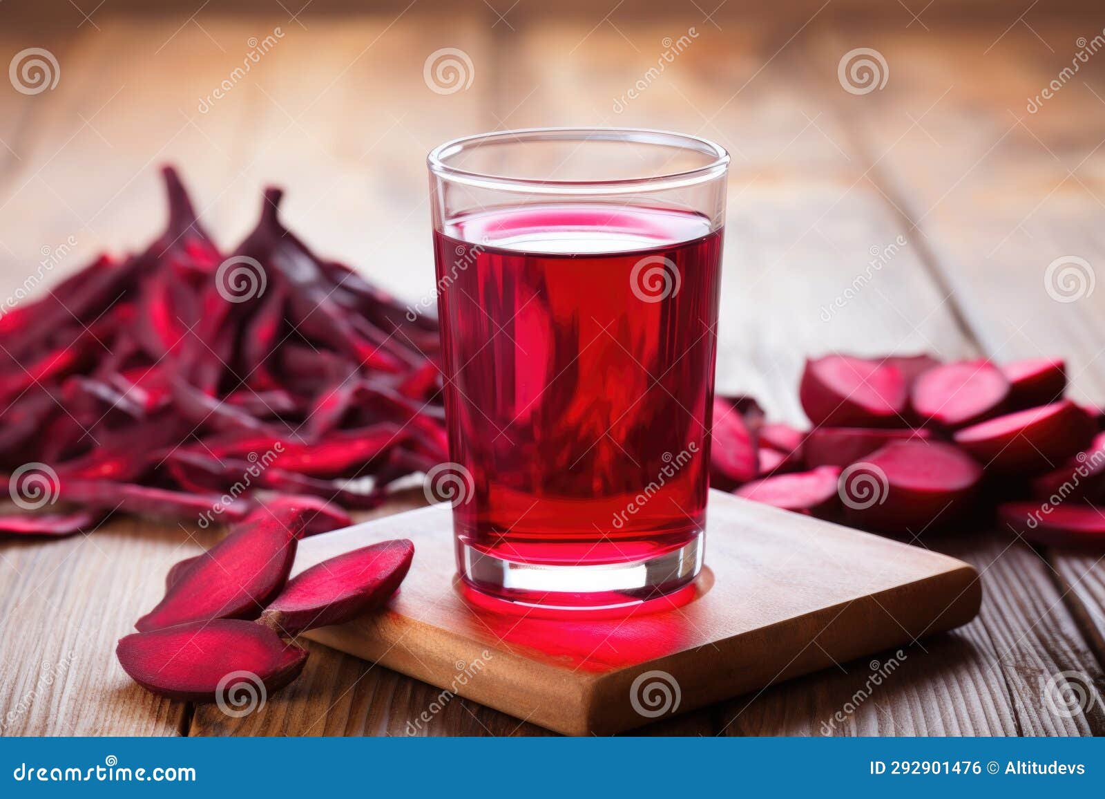 A Cold Pressed Beet Juice Amidst Fresh Beetroot Slices Stock Photo ...
