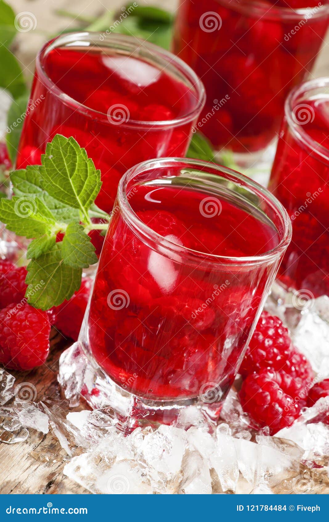 Cold Raspberry Drink with Mint and Ice, Selective Focus Stock Photo ...