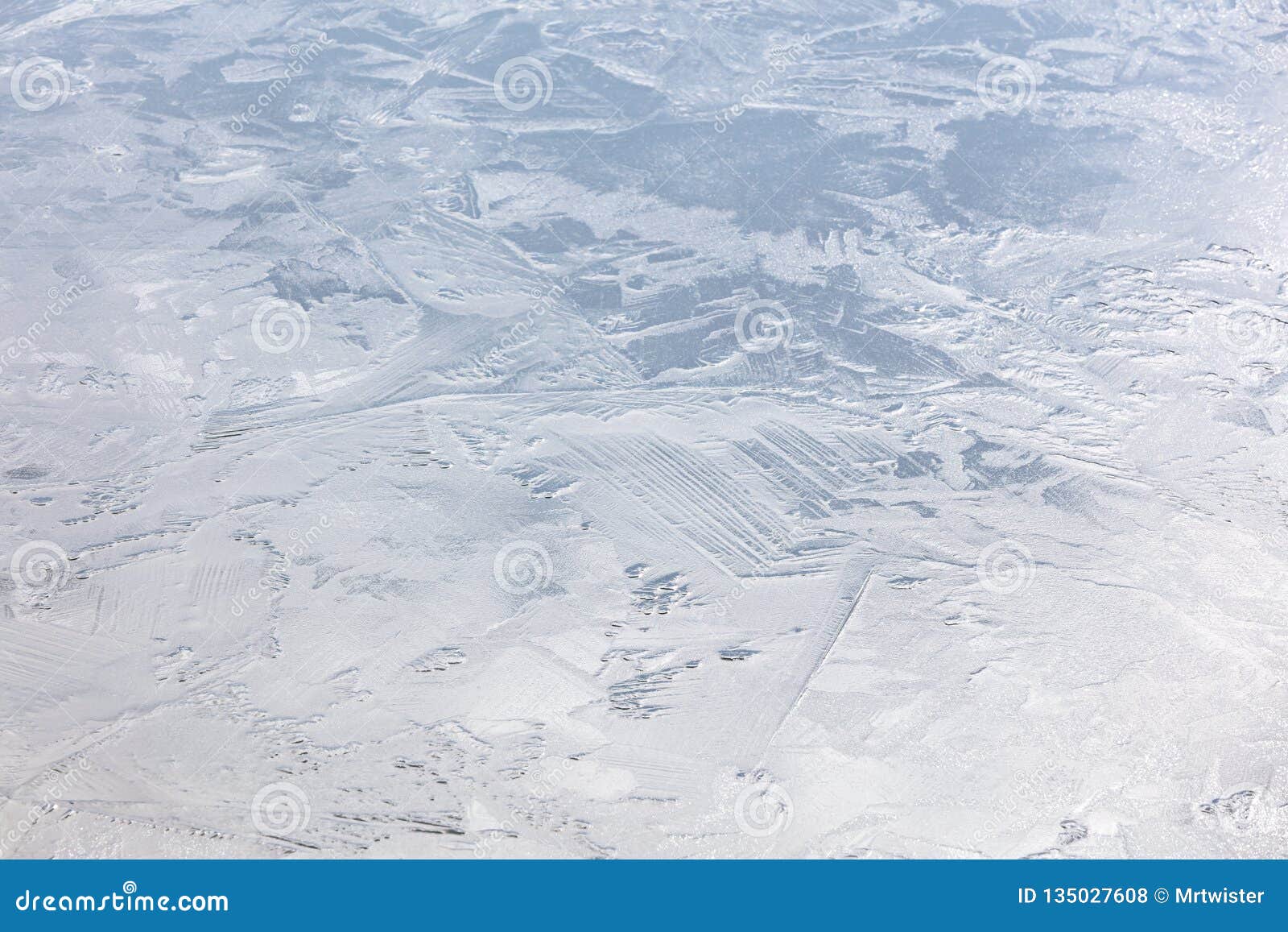 Cold Shiny Ice Surface with Cracks, Patterns and Scratches. Natural ...