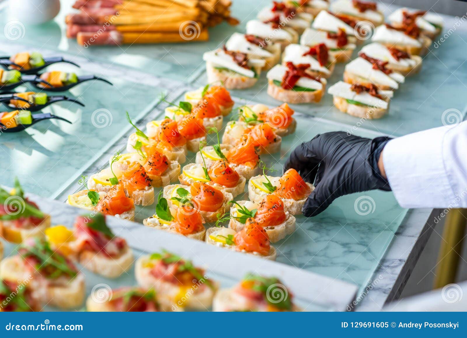 Cold snacks on the table stock image. Image of food - 129691605