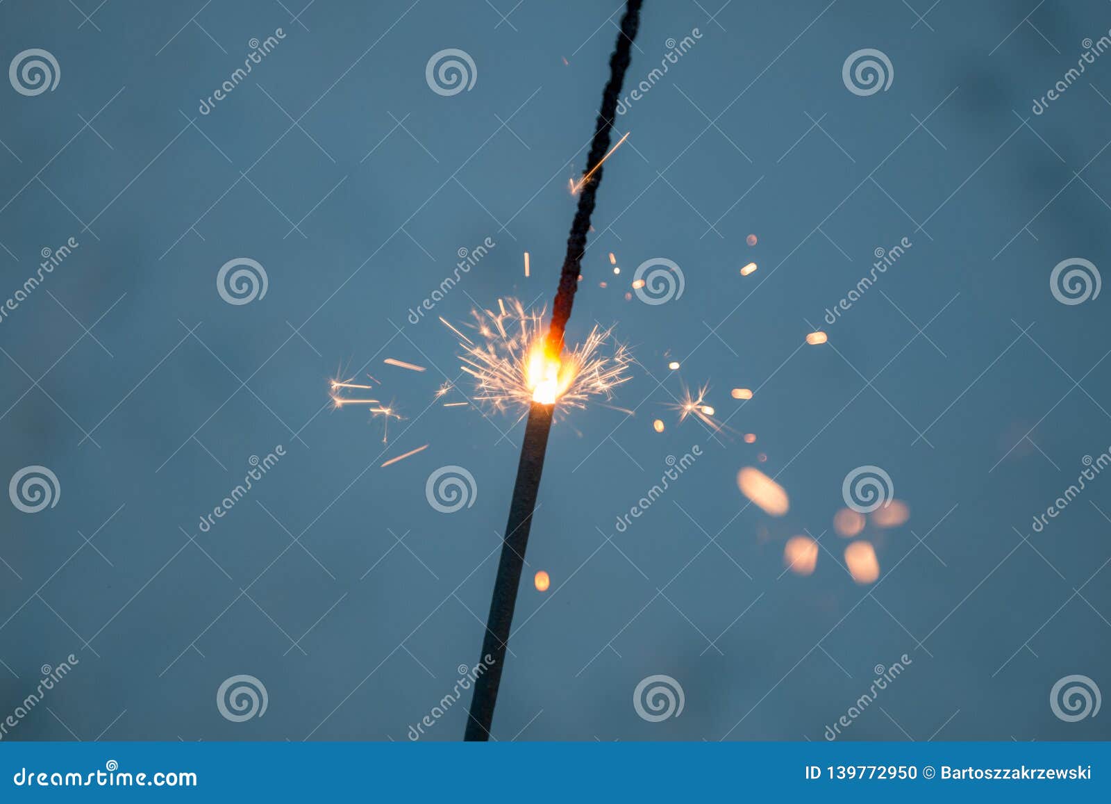 Cold Sparklers on a Blue Background Stock Photo - Image of holiday ...