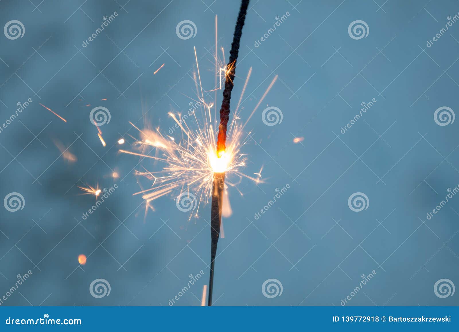 Cold Sparklers on a Blue Background Stock Photo - Image of blue ...