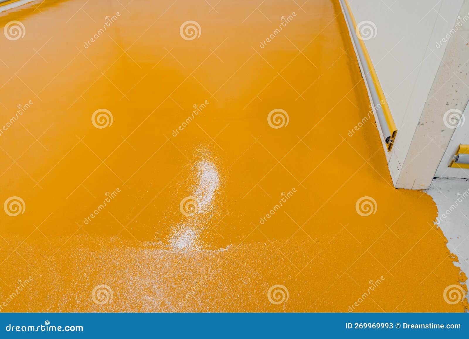 New Polished Concrete Floor Covered with a Layer of Yellow Epoxy Resin ...