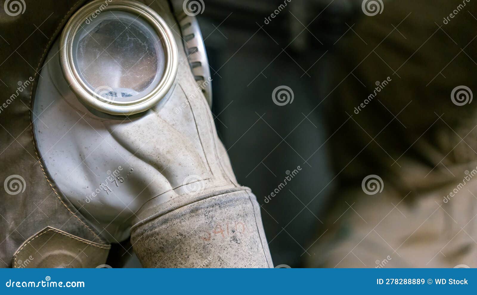 A Cold War Gas Mask on a Wall Stock Image - Image of survive, hand ...