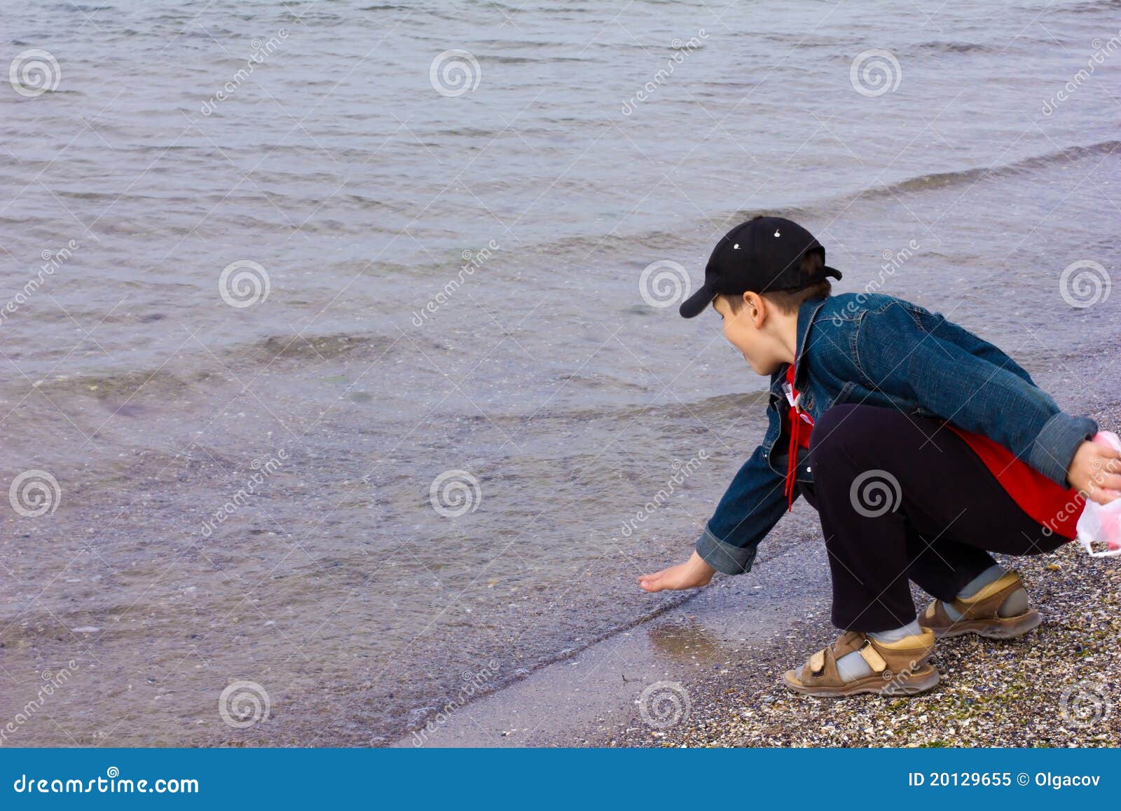 Cold water stock image. Image of hand, pebbles, touching - 20129655