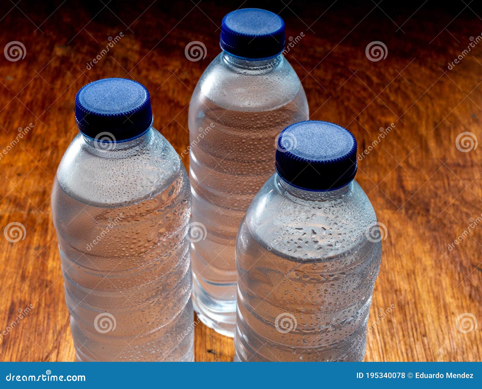 Cold water bottles stock photo. Image of liquid, clear - 195340078