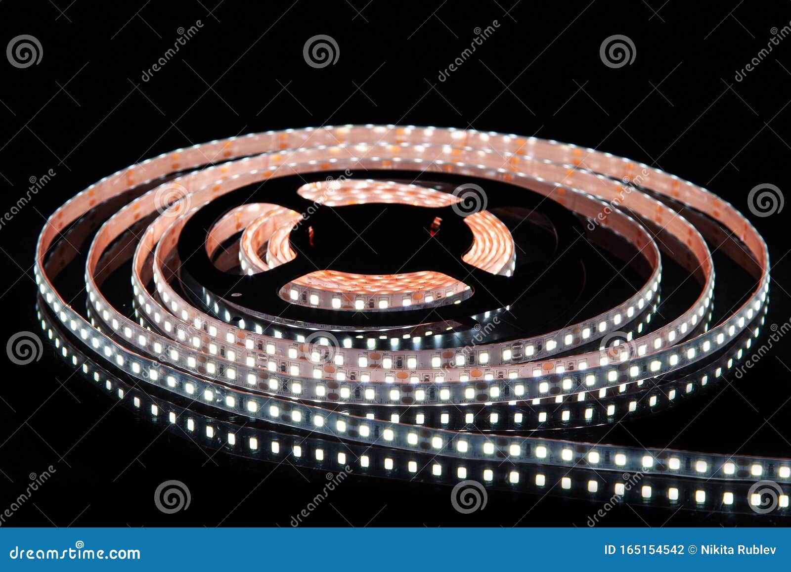 Cold White LED Strip on Reel with Black Background Stock Photo - Image ...