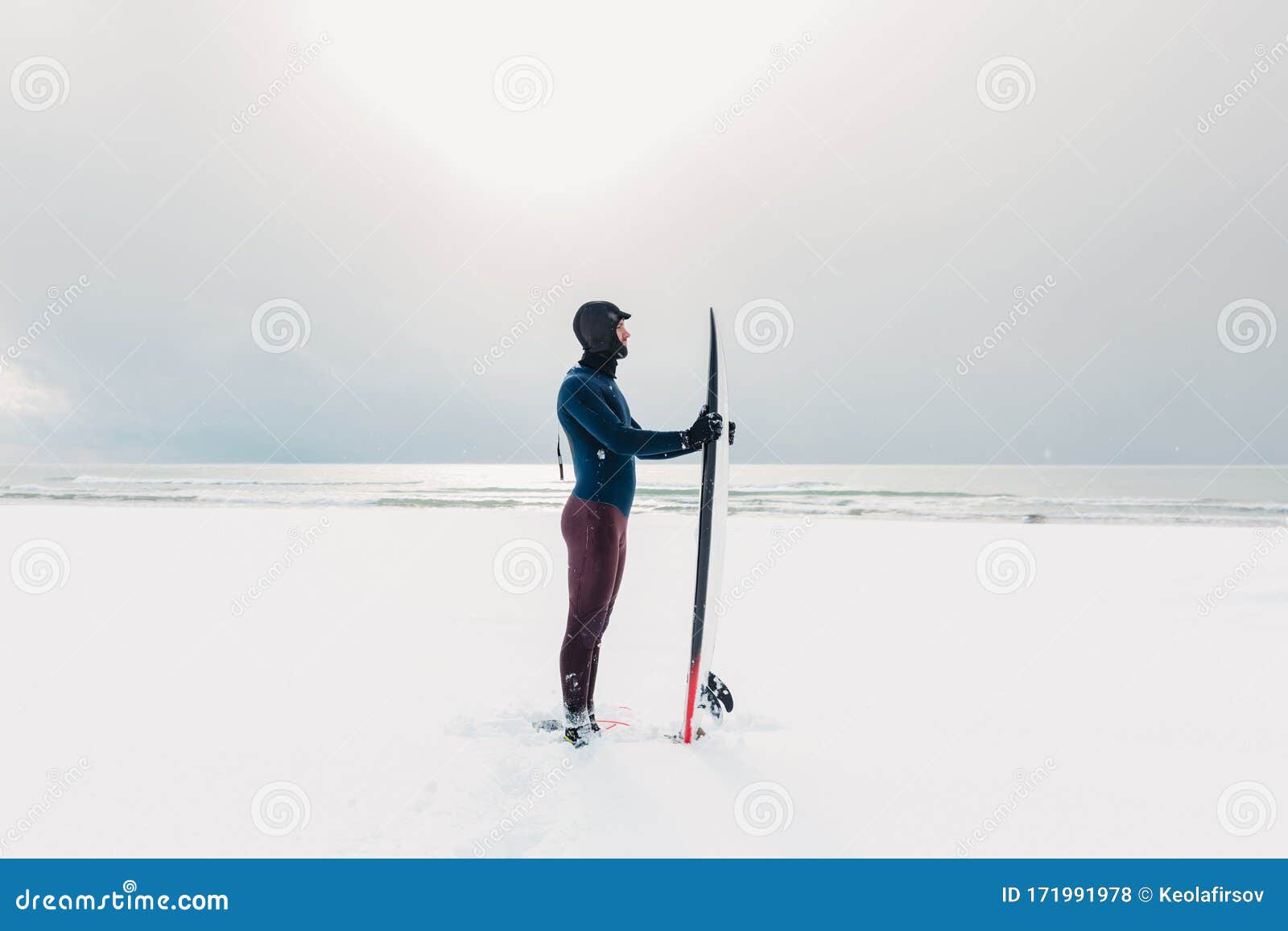 Cold Winter and Surfer with Surfboard. Snowy Day with Surfer in Wetsuit ...