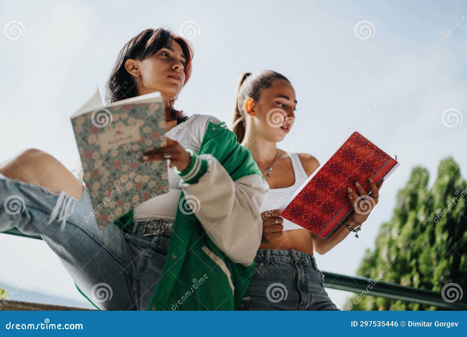 Two Students Study Together in the City, Discussing a School Project ...