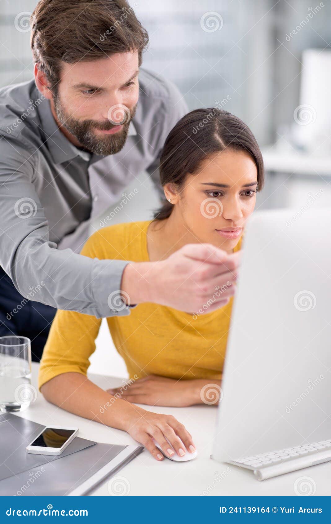 Collaborating on an Important Project. Two Colleagues Working Together ...