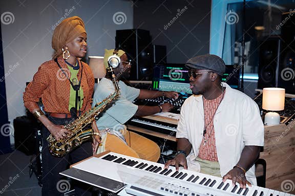 Collaborating in Modern Recording Studio with Instruments Stock Image ...