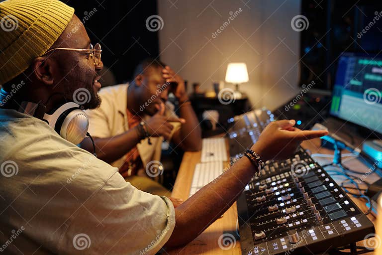 Collaborating in Music Production in Studio Environment Stock Photo ...