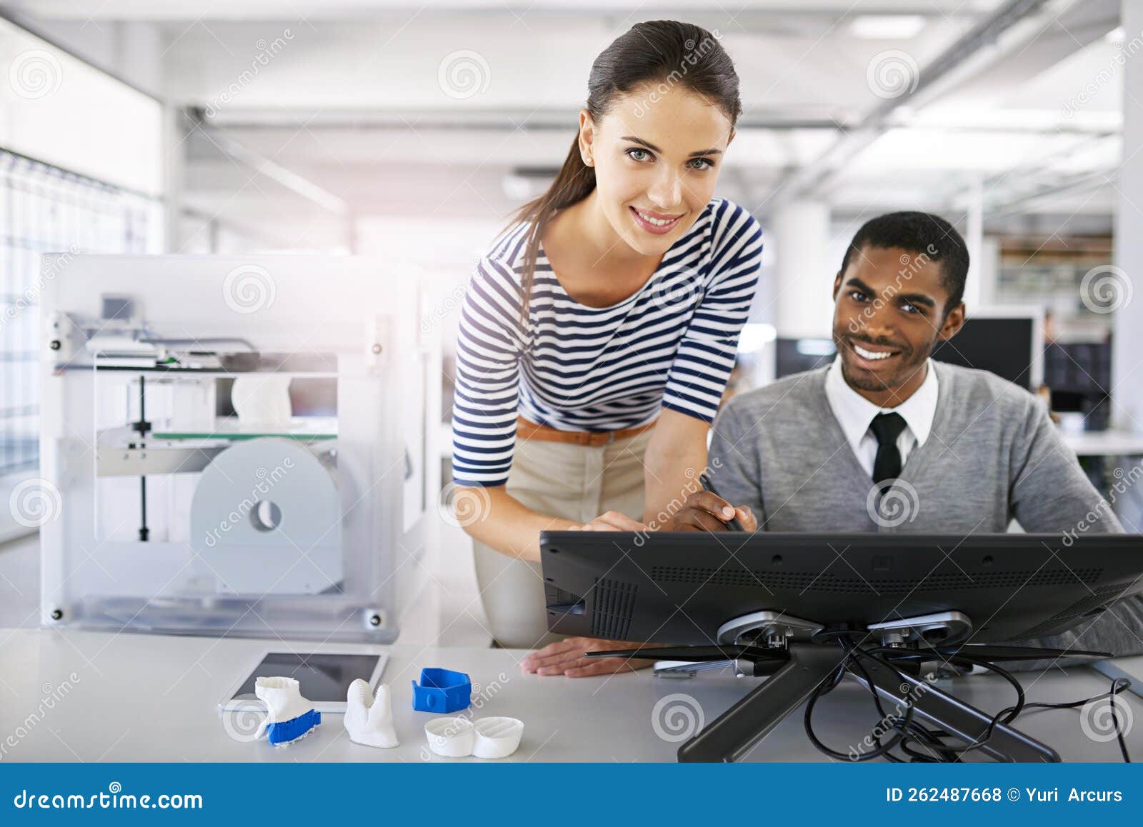 Collaborating Over Technology. Portrait of Two Colleagues Working ...