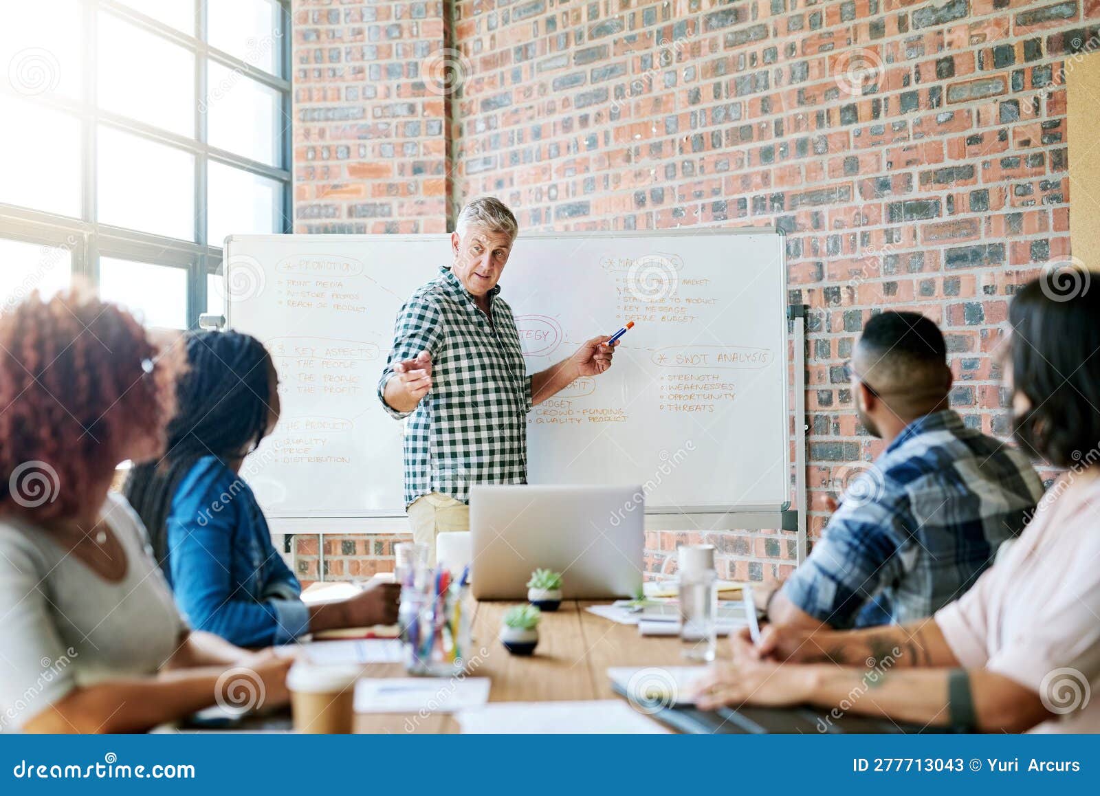 Collaborating To Help Stimulate and Evolve New Ideas. a Businessman Giving a Presentation in the ...