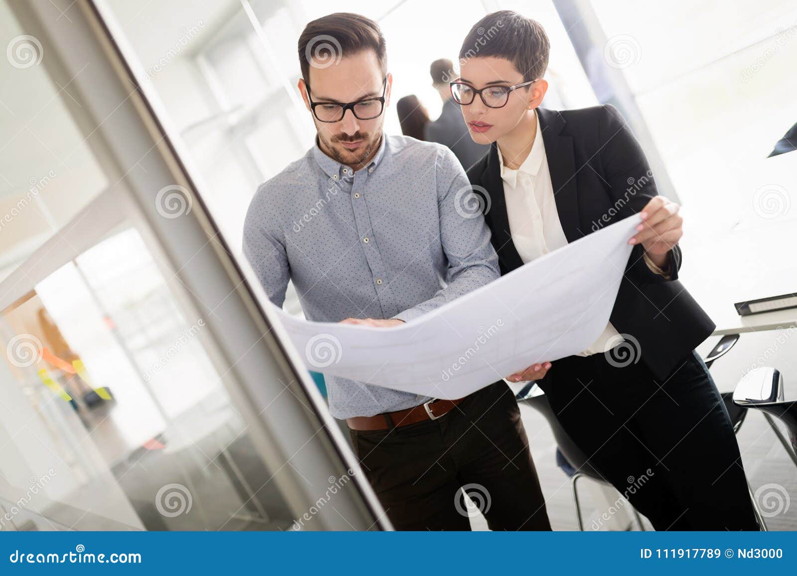 Collaboration and Analysis by Business People Working in Office Stock ... Collaboration and Analysis by Business People Working in Office Stock ...