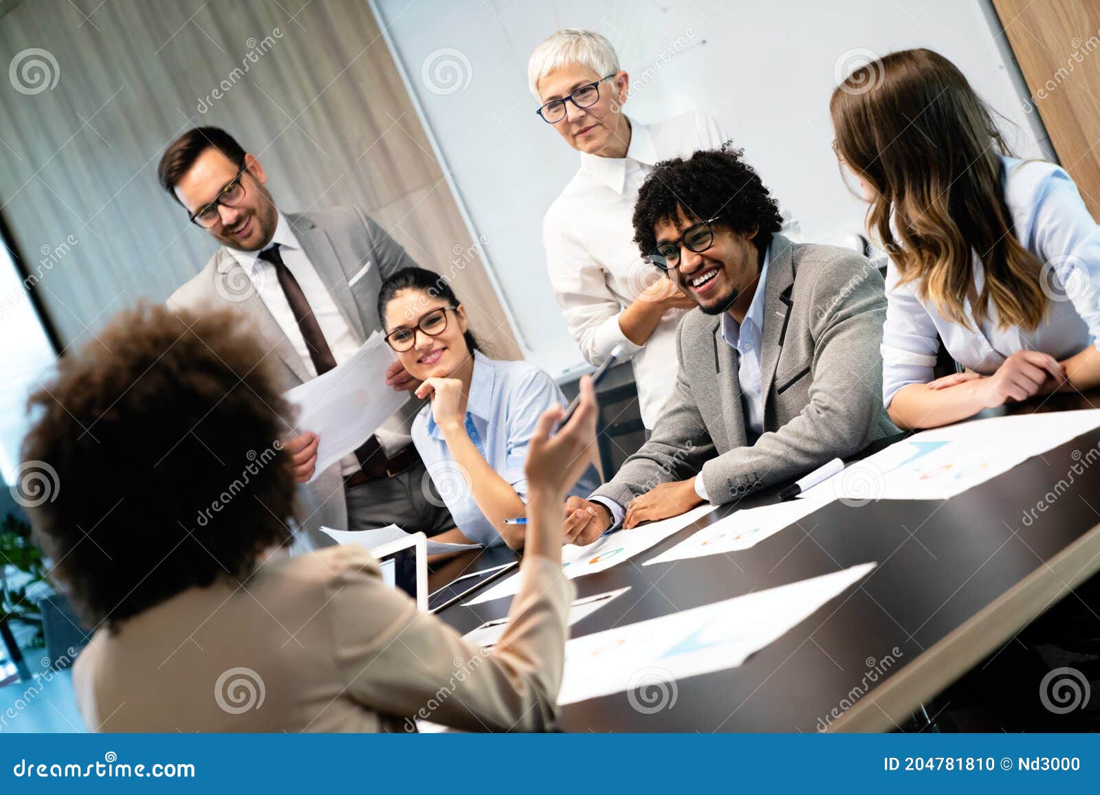 Collaboration and Analysis by Business People Working in Office Stock ... Collaboration and Analysis by Business People Working in Office Stock ...