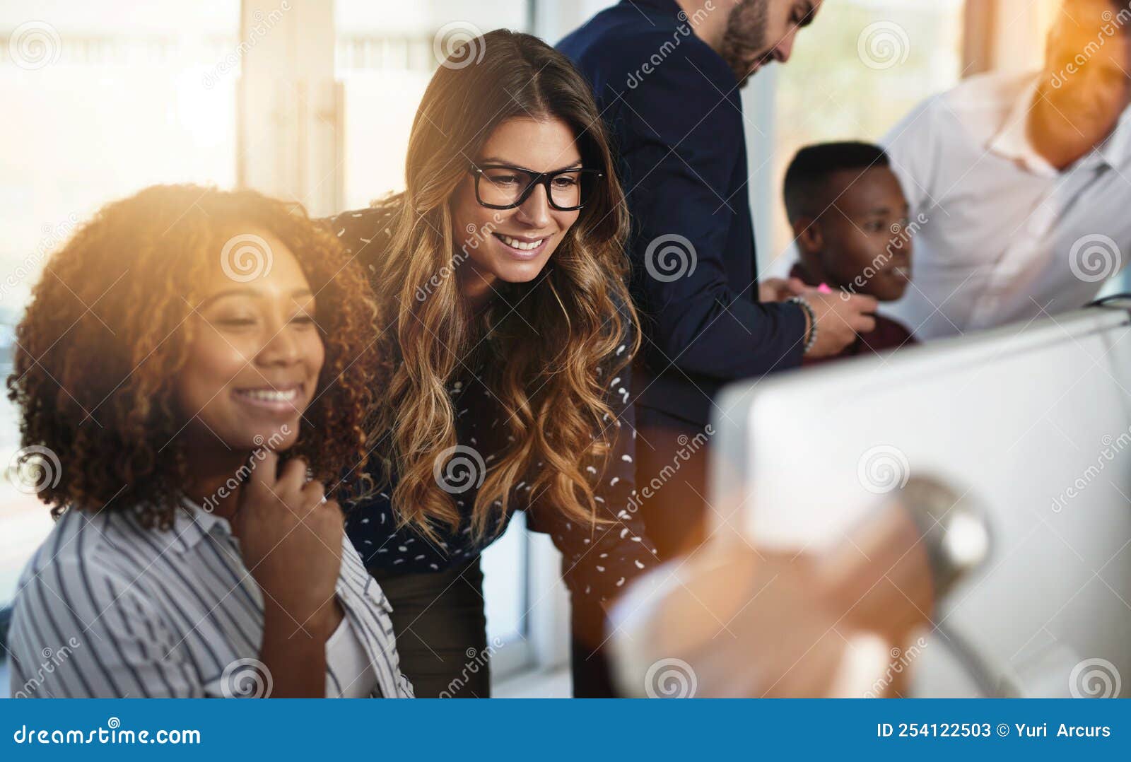 Collaboration Produces Better Outcomes. Two Designers Working Together ...