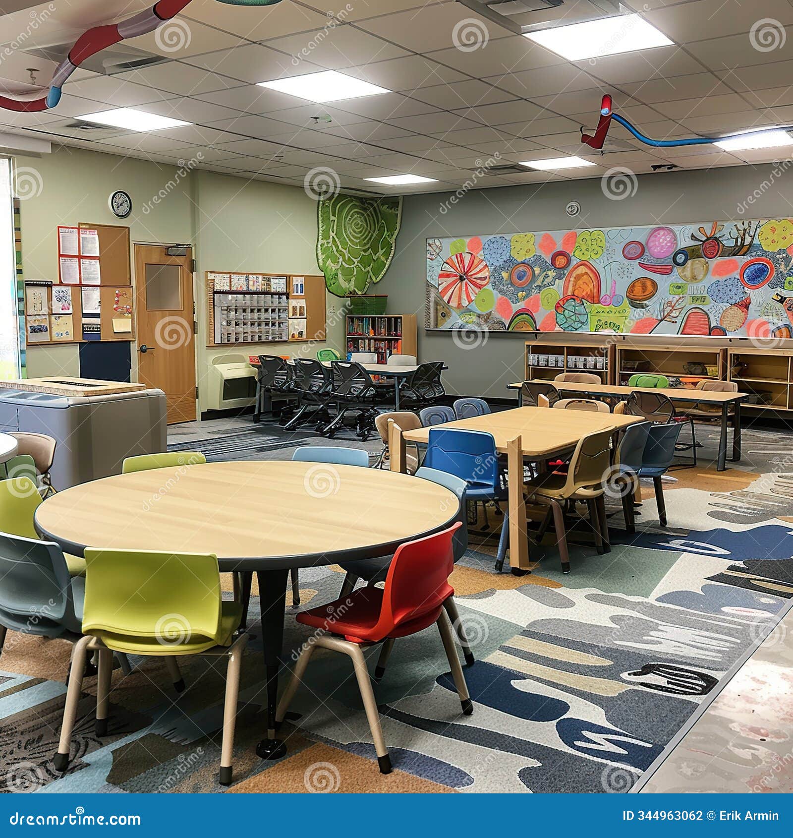 A Collaborative Study Area with Group Work Tables, Clearly Marked Zones ...