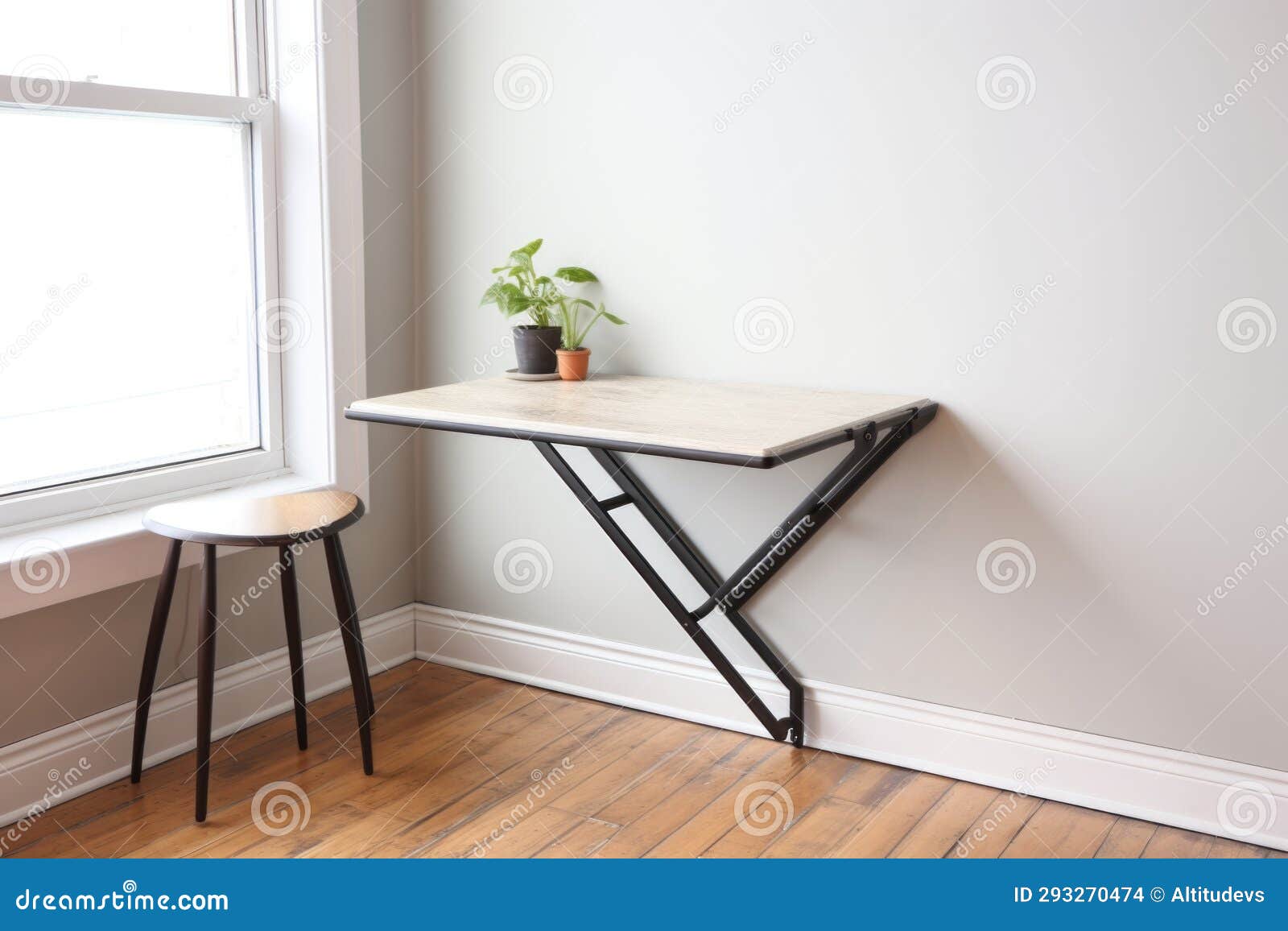 Collapsible Dining Table Against a Plain Wall Stock Photo - Image of ...