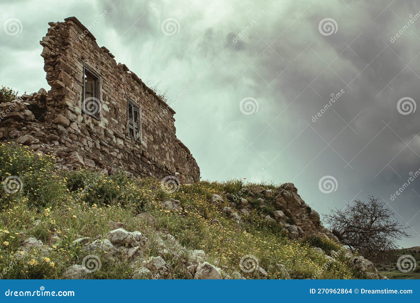 Collapsing Damaged Brick Wall. Abandoned Deserted House Against Cloudy ...
