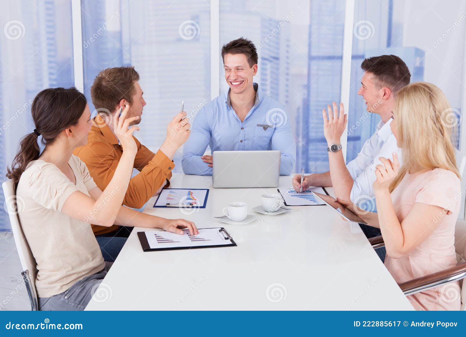 Colleagues Asking Question To Manager during Conference Meeting Stock ...