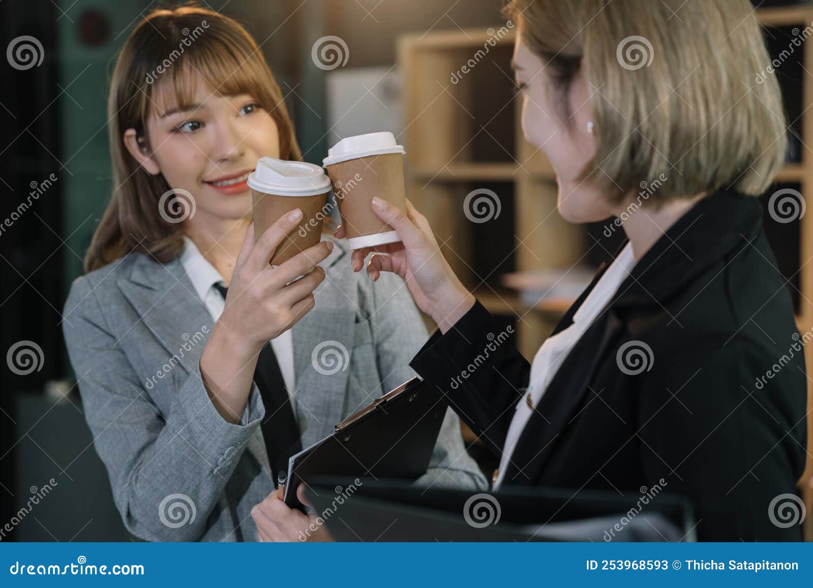 Colleagues Clinking Cups of Coffee in Office Stock Image - Image of ...