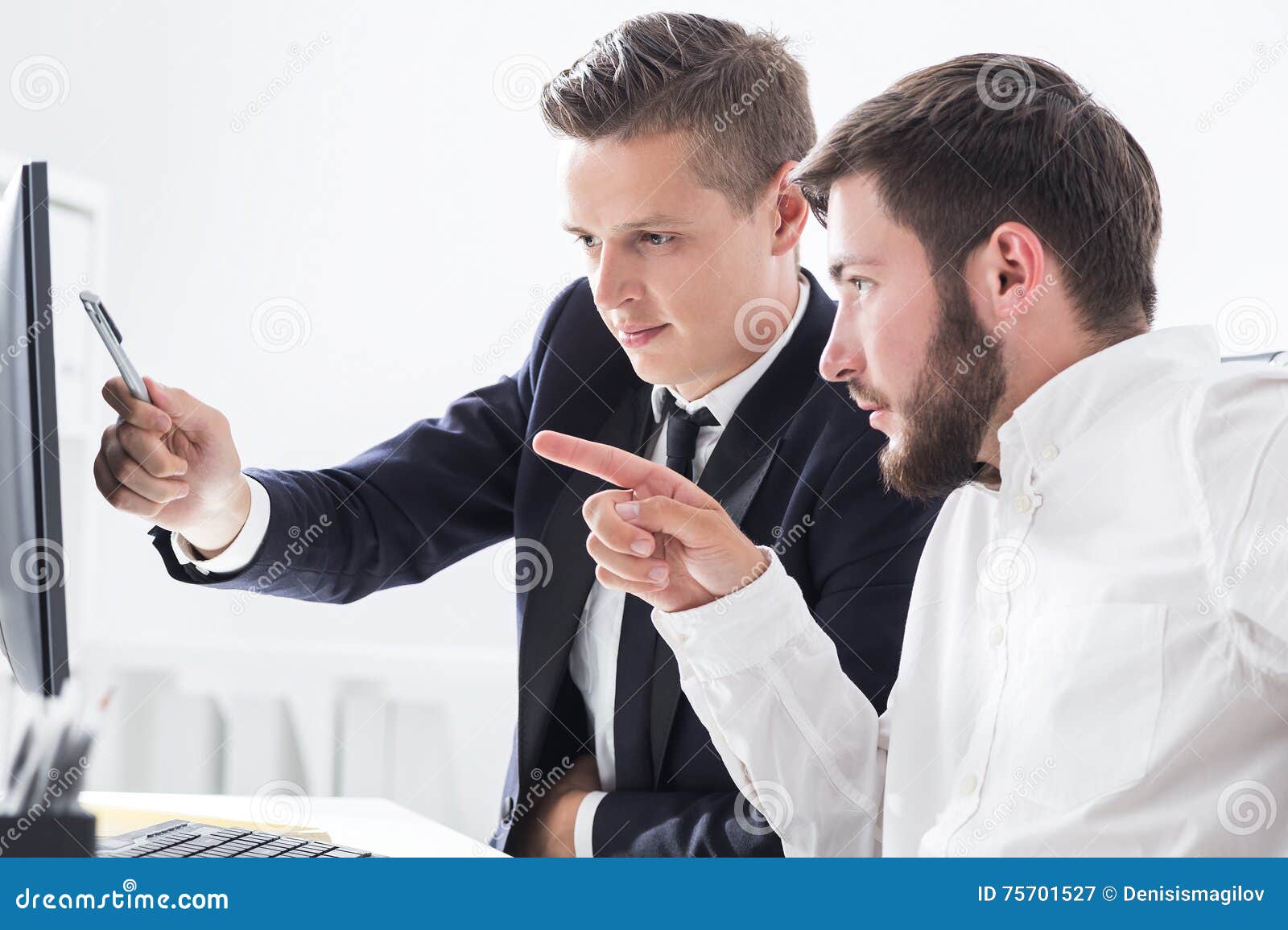 Colleagues Communicating at Computer Table Stock Image - Image of point ...