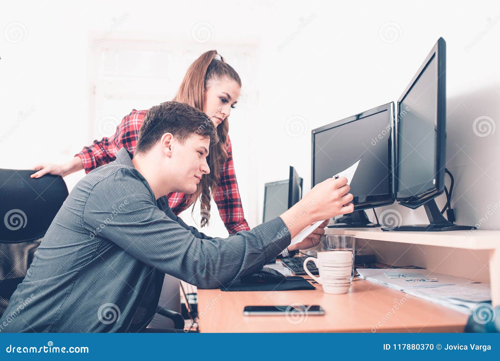 Colleagues Comparing Documents Stock Photo - Image of company, paper ...