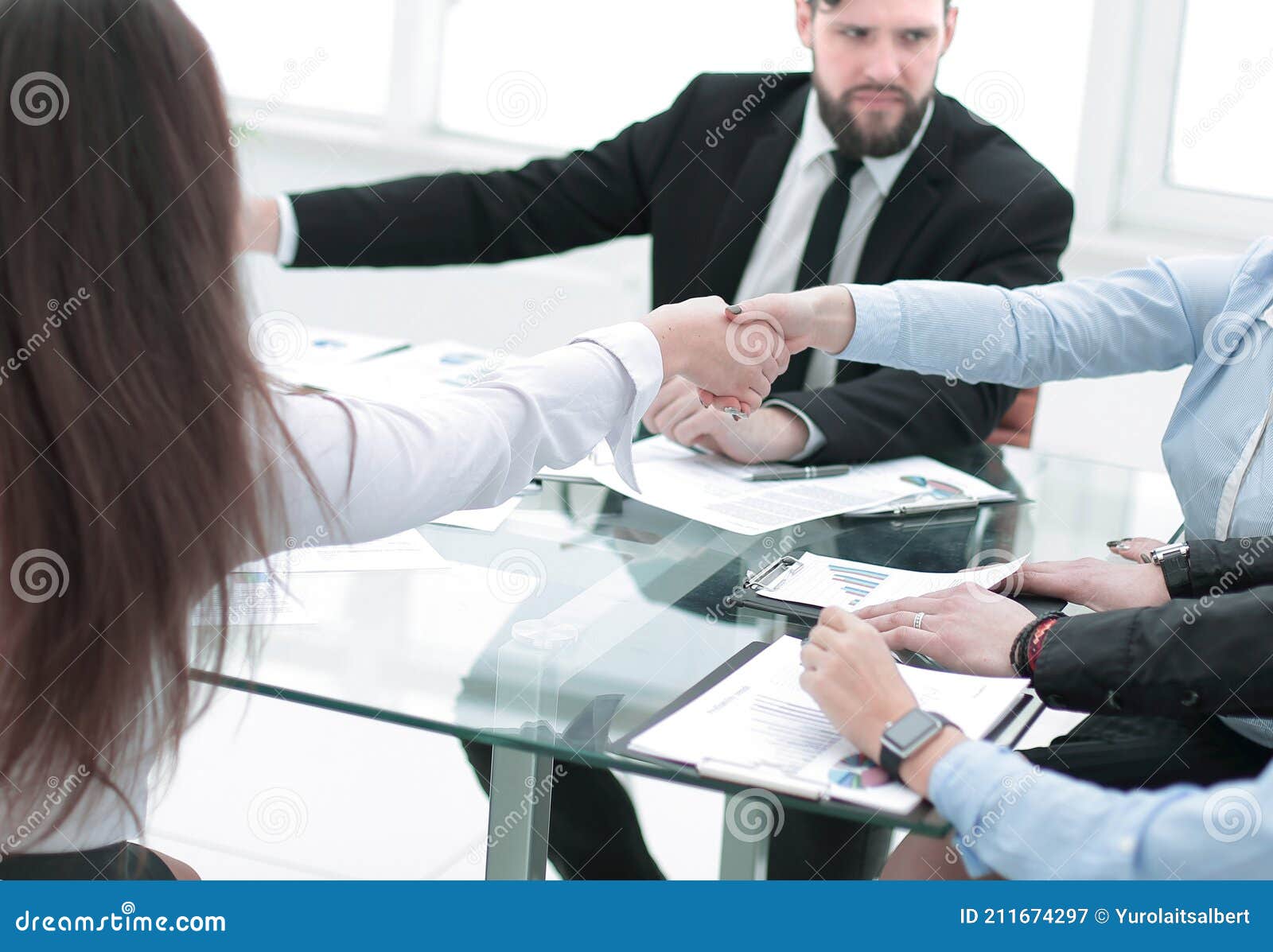 Colleagues Confirming the Job with a Handshake Stock Image - Image of ...
