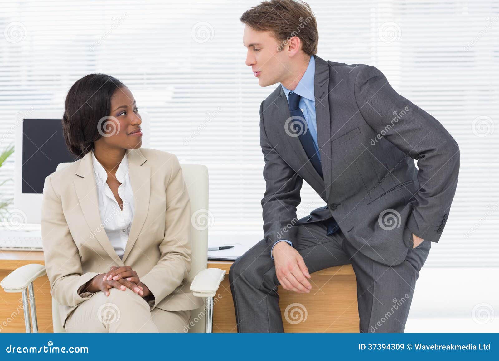 Colleagues Conversing in Office Stock Image - Image of career, indoors ...