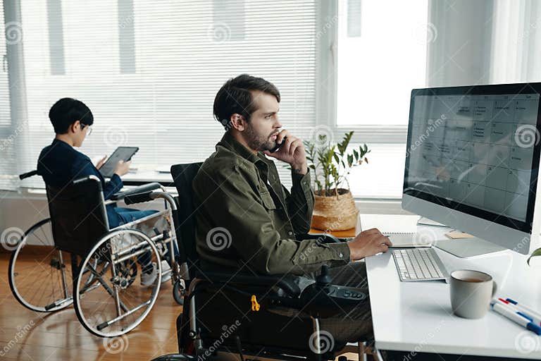 Colleagues with Disability Working in Office Stock Photo - Image of ...