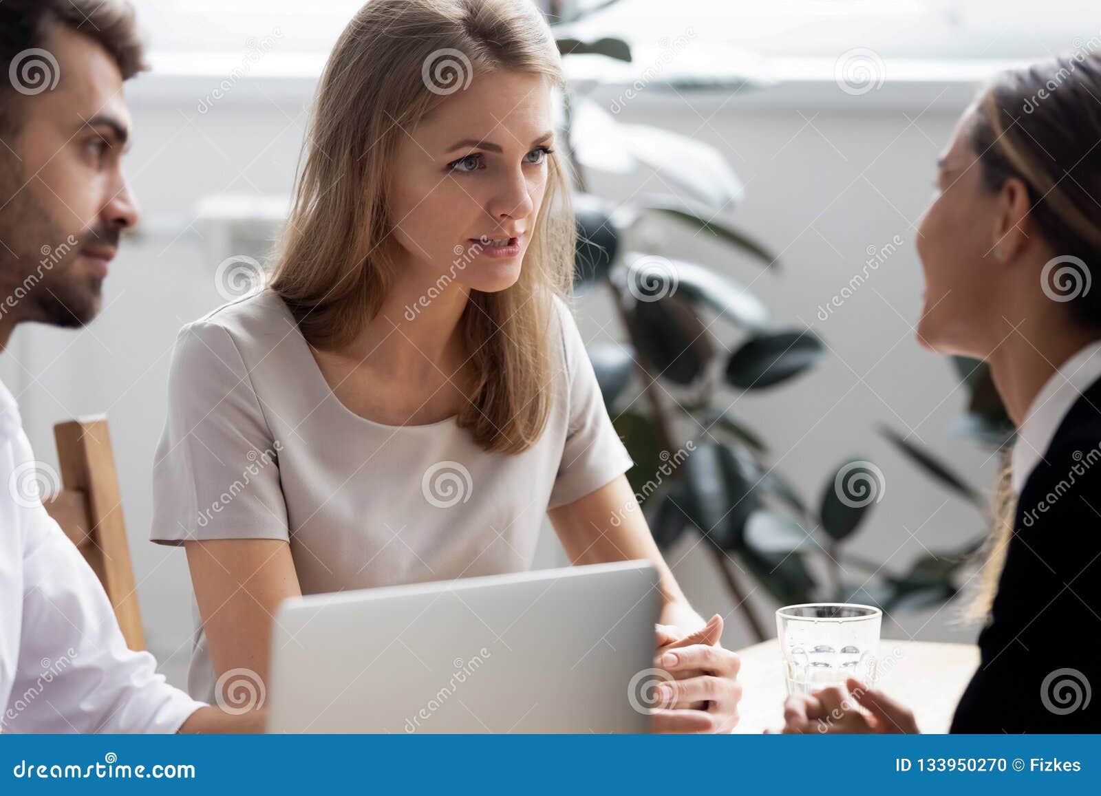 Colleagues Discuss Current Working Issues during Workday Stock Photo ...