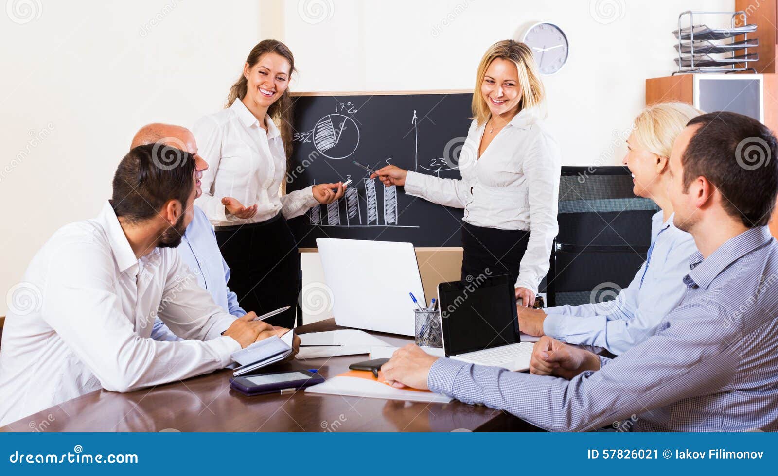 Colleagues Discussing Price Development Stock Image - Image of european ...