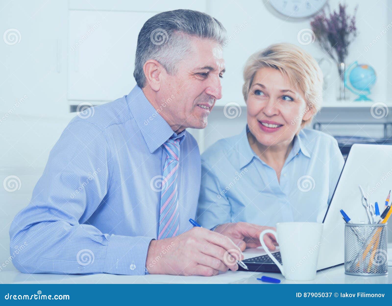 Colleagues Discussing Project Stock Image - Image of cheerful, laptop ...