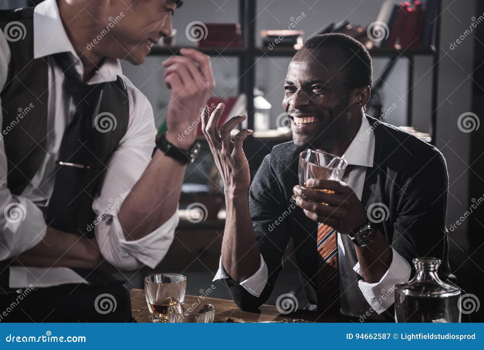 Colleagues Drinking Alcohol while Spending Time Together after Work ...