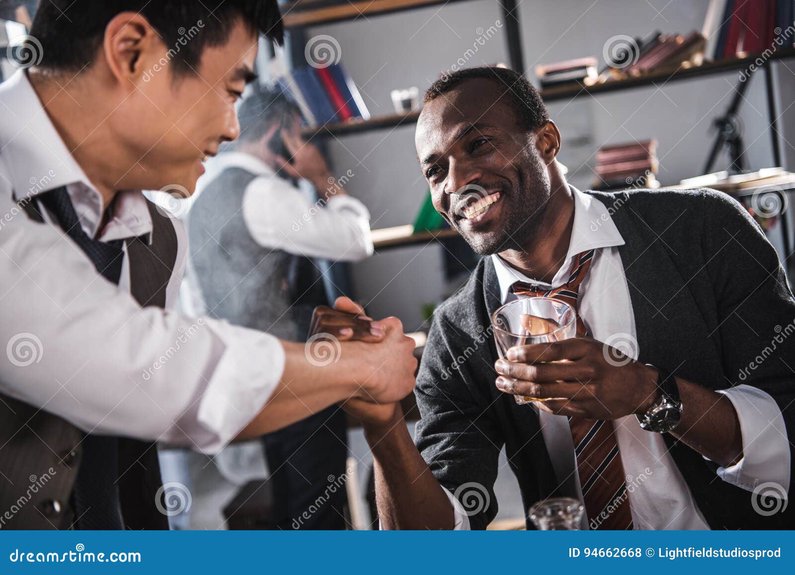 Colleagues Drinking Alcohol while Spending Time Together after Work ...